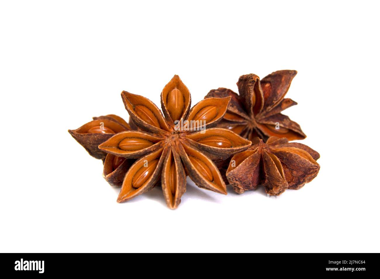 Star anise spice fruits and seeds isolated on white background closeup ...