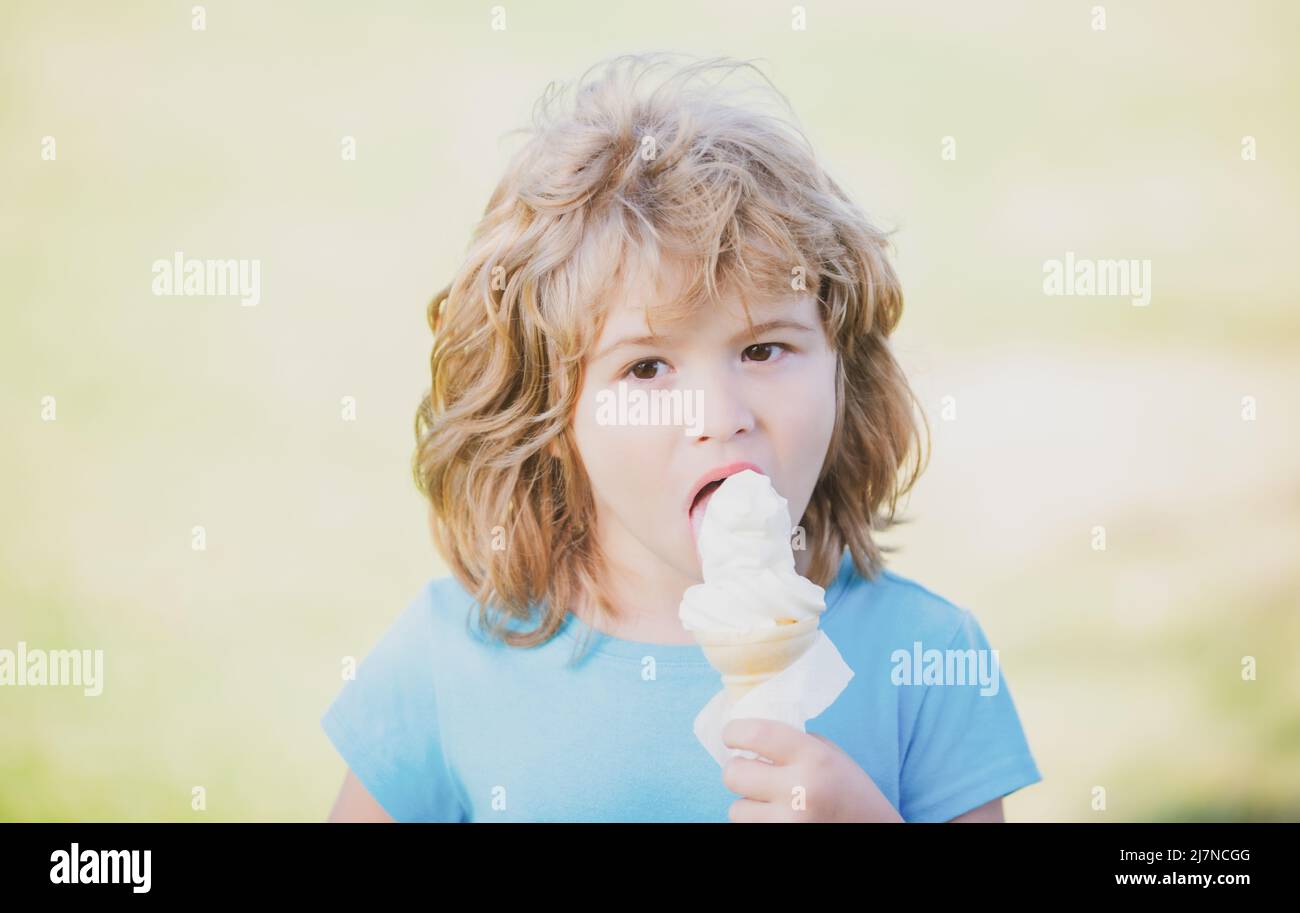 Caucasian child eating ice cream, portrait close up. Kids face Stock ...