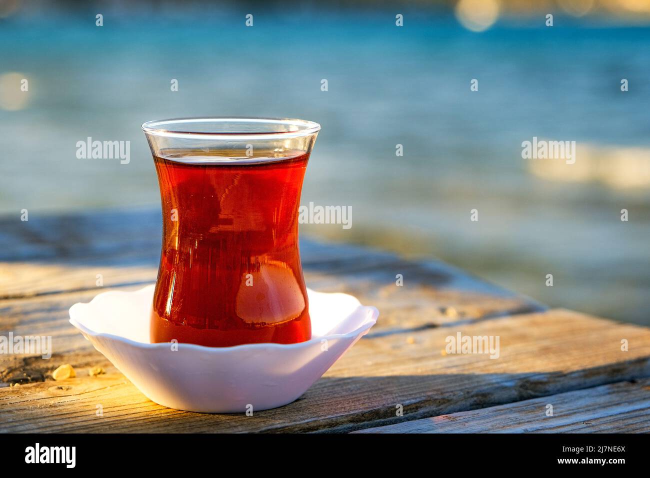 Glass of traditional Turkish tea at the seaside Stock Photo - Alamy
