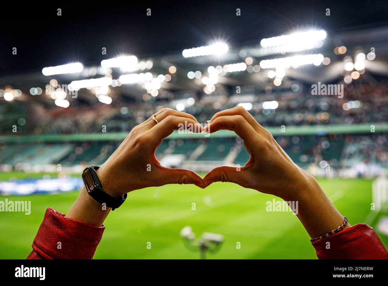She loves this team. Heart shape for the favorite football club during ...
