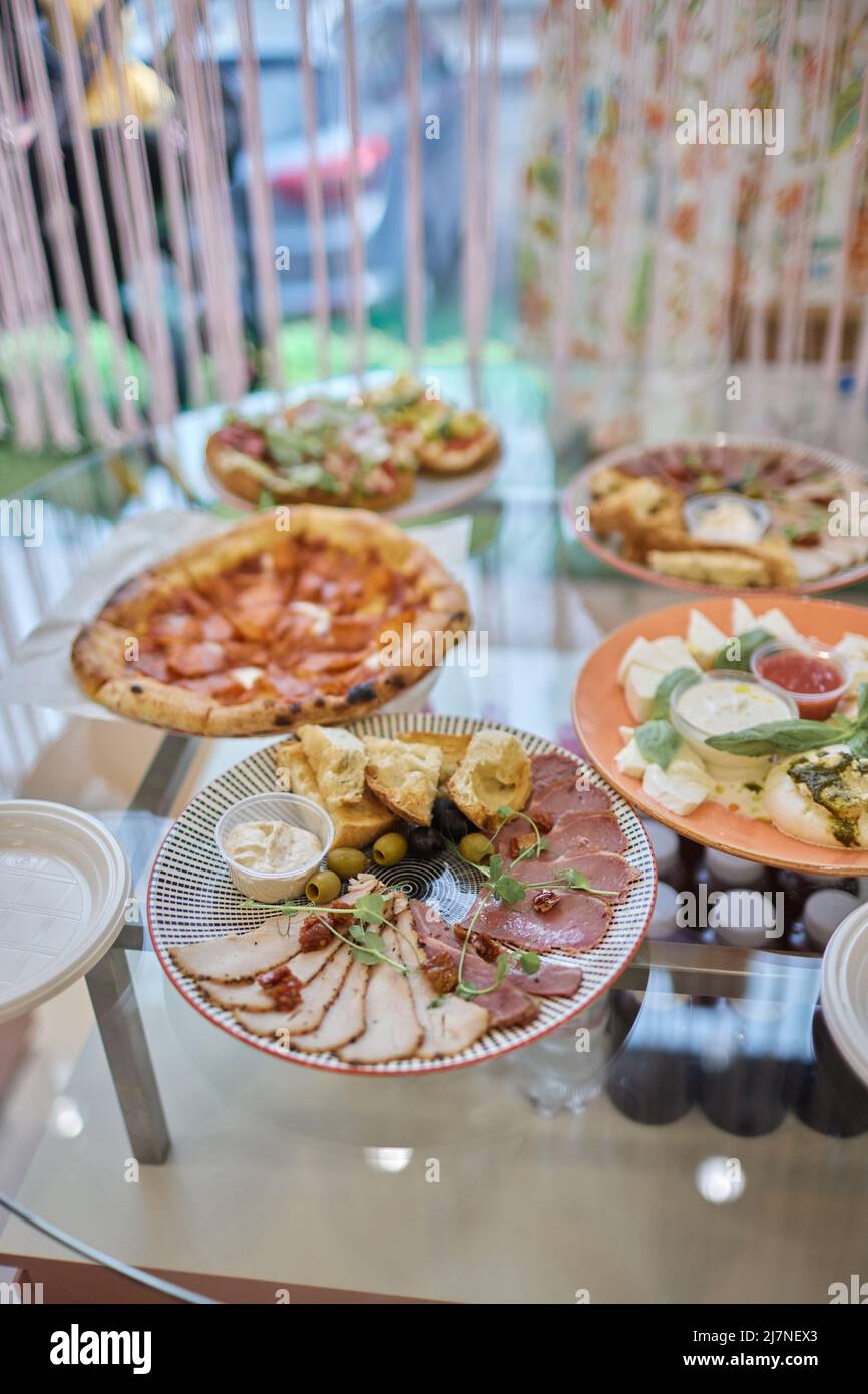a lot of cold snacks on buffet table, catering Stock Photo - Alamy