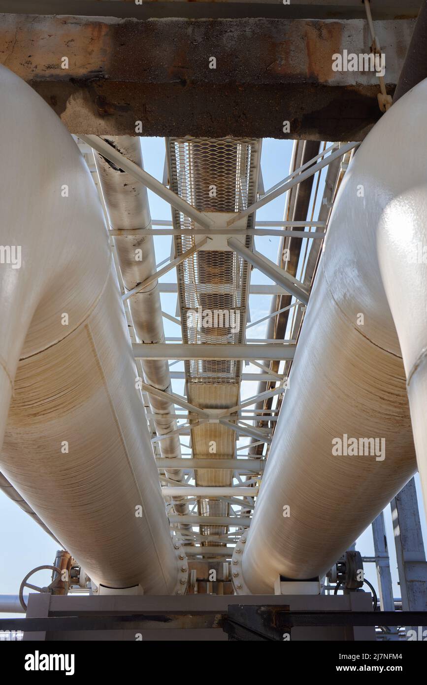 Oil refinery chemical plant wide view with copyspace over blue evening ...