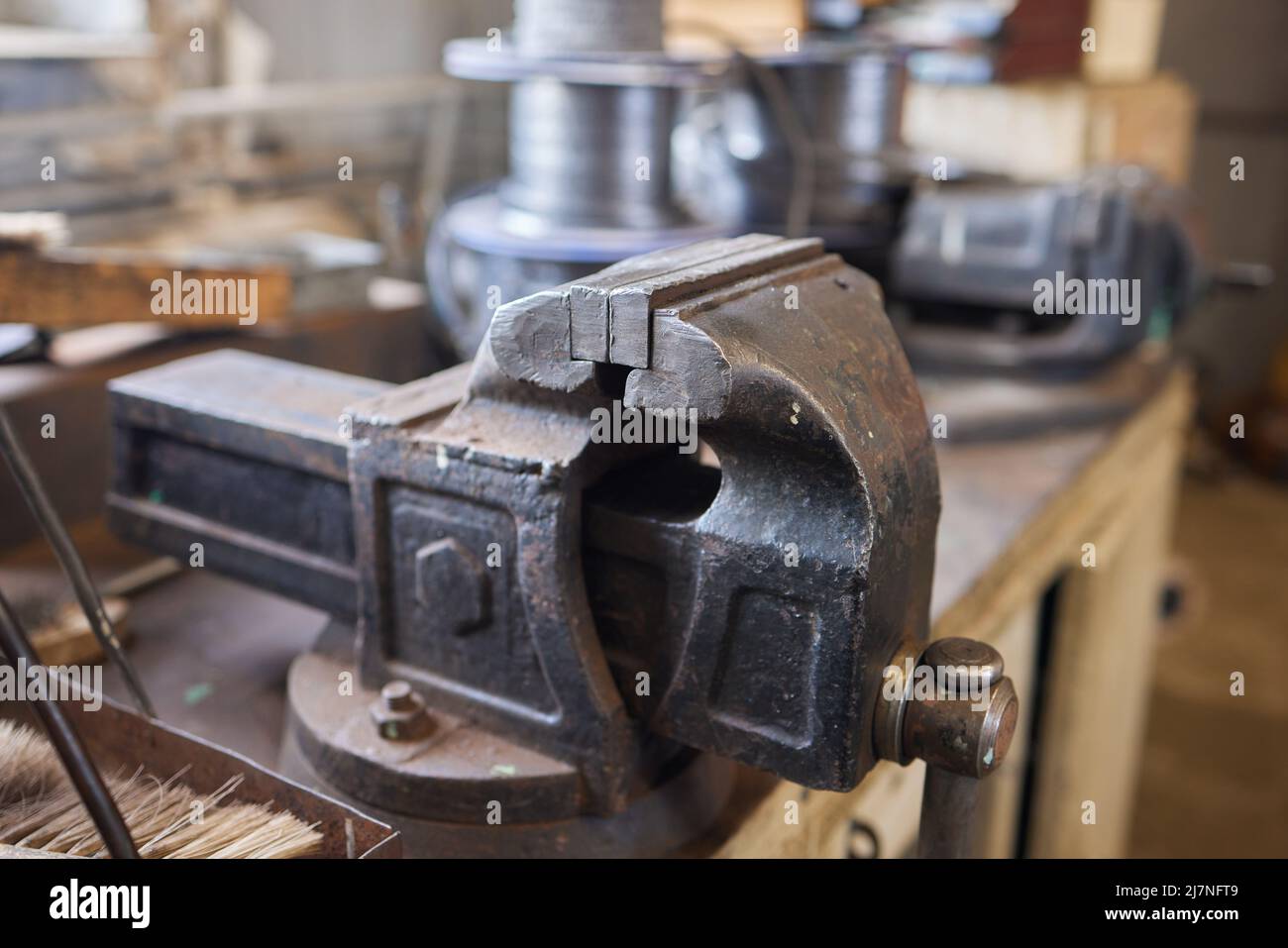 Close up hand heavy industrial worker is working on metal work factory ...
