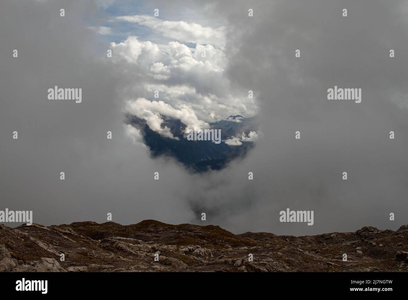 window in the cloud frame in austrian alps Stock Photo - Alamy