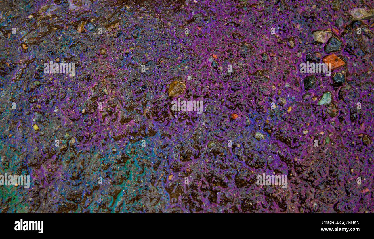 Neon purple background. Chemical stain on concrete. Toxic chemicals ...