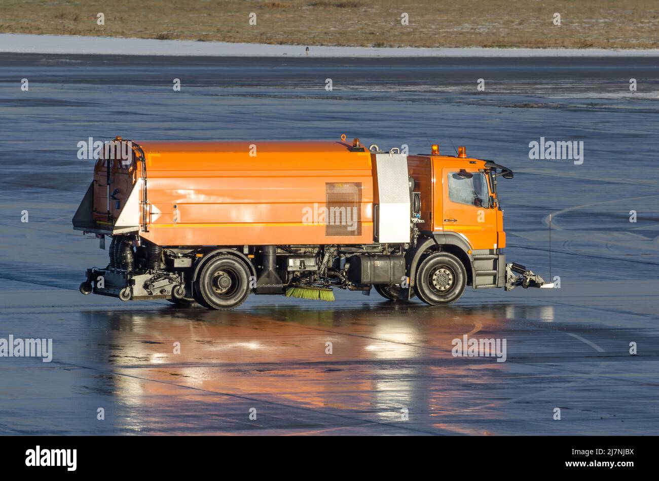 Cleaning machine wet asphalt at the international airport Stock Photo ...