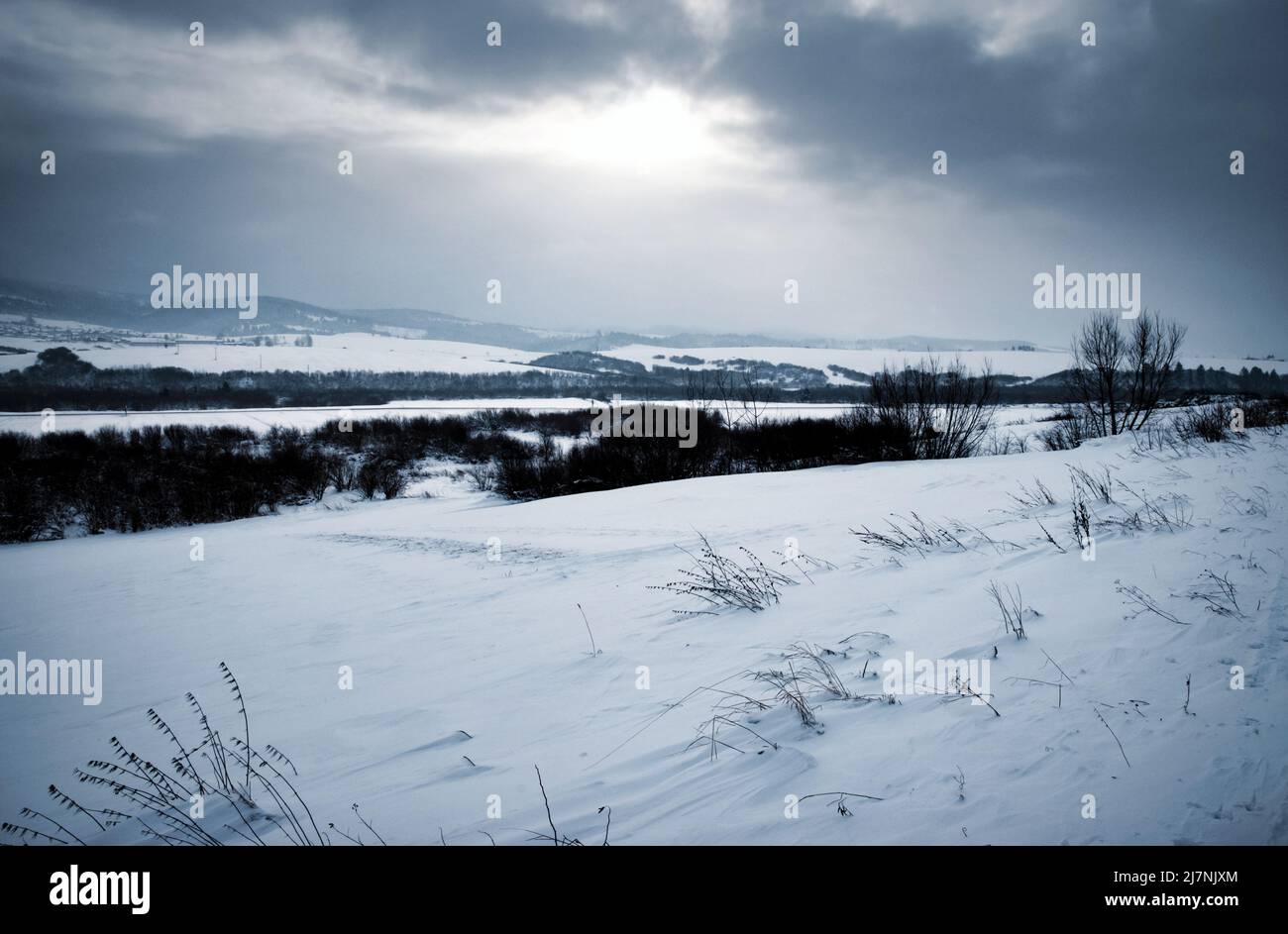 seasonal background gloomy winter landscape with snow Stock Photo - Alamy