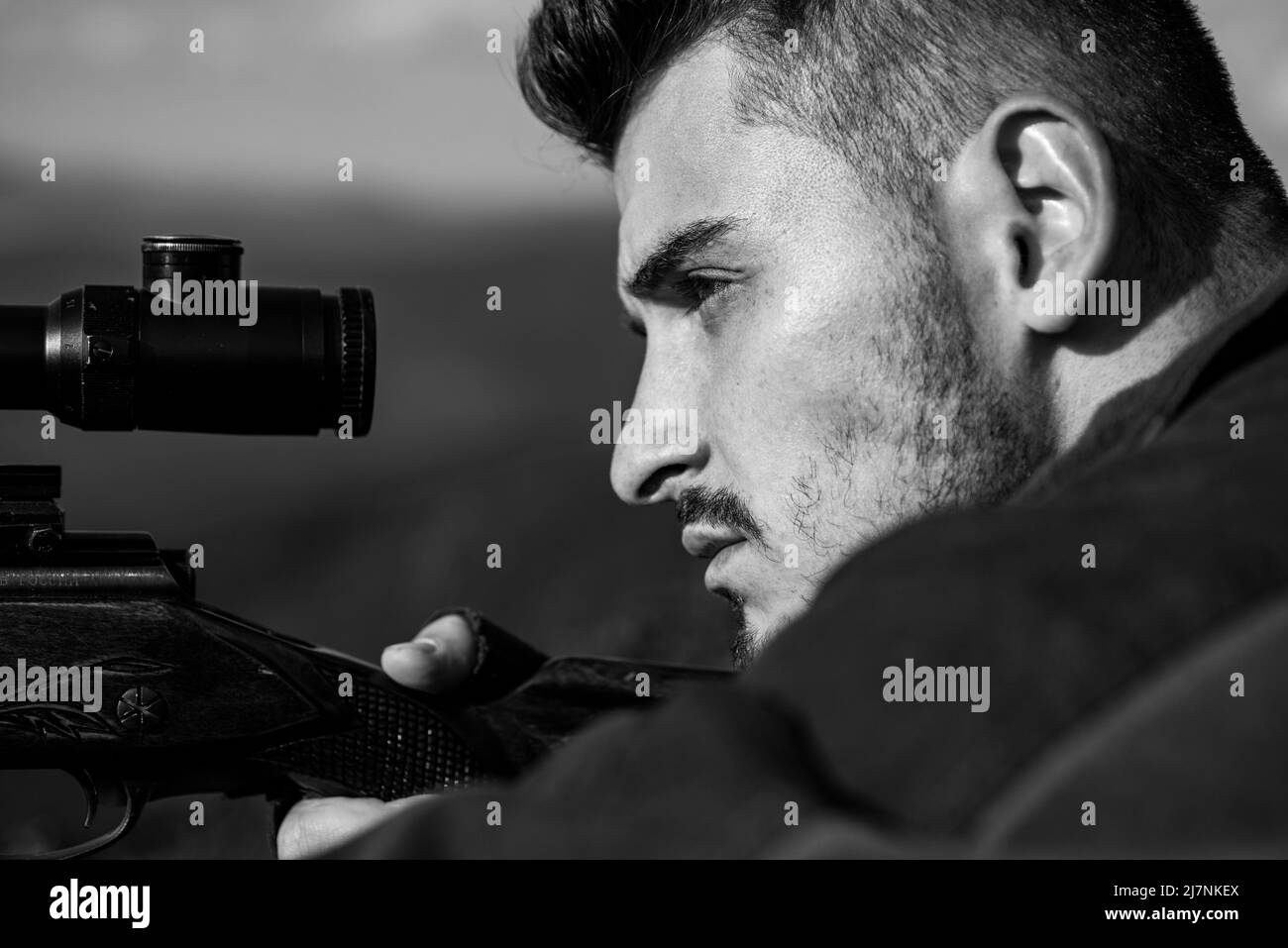 Close up snipers carbine at the outdoor hunting. Close-up Target with ...