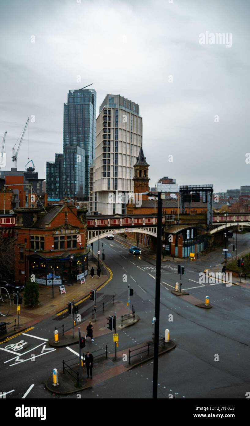 Deansgate cross-road with viaduct and Beetham Tower in the background ...