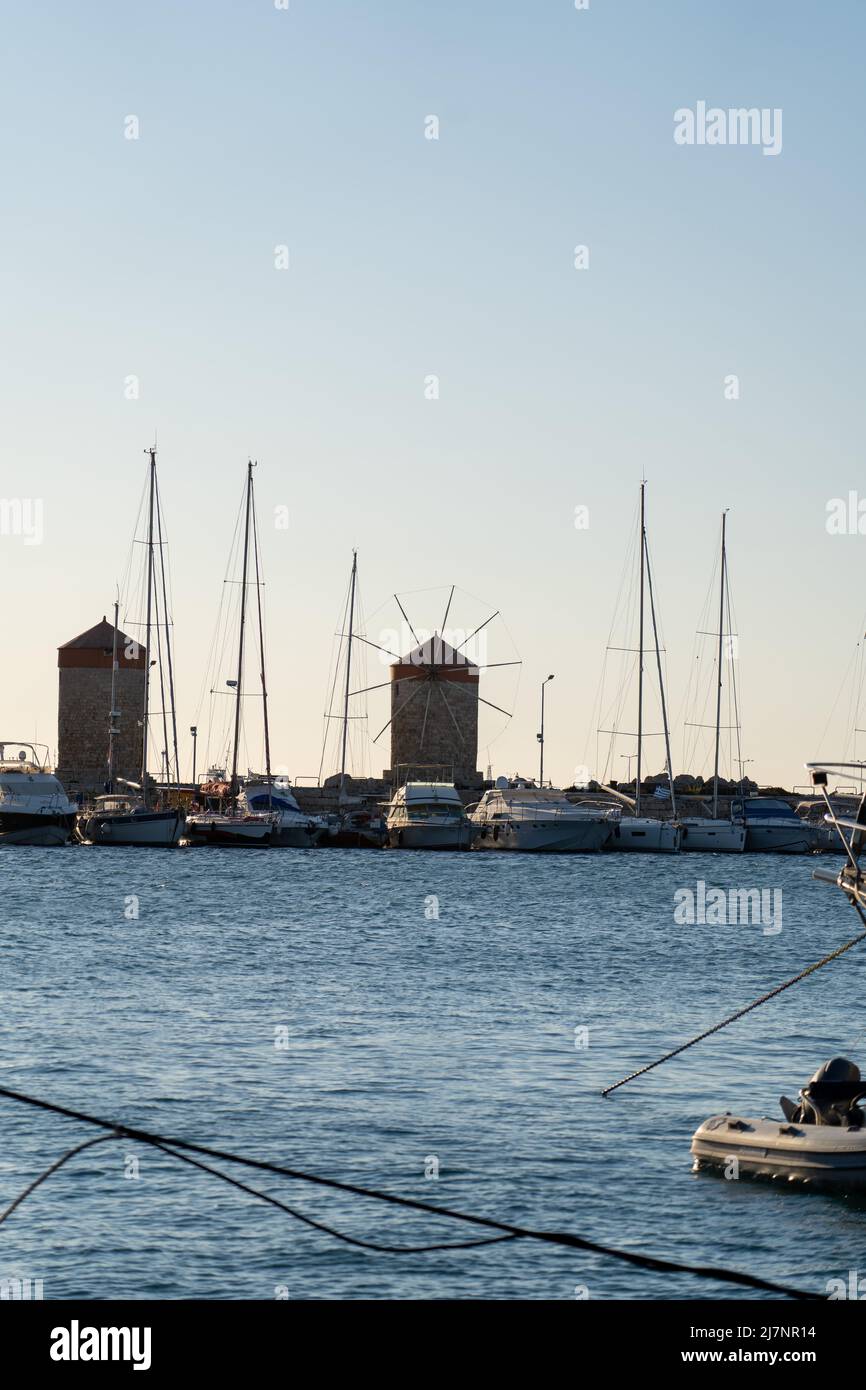 Windmills in Mandraki Harbor in Rhodes Greece Stock Photo - Alamy
