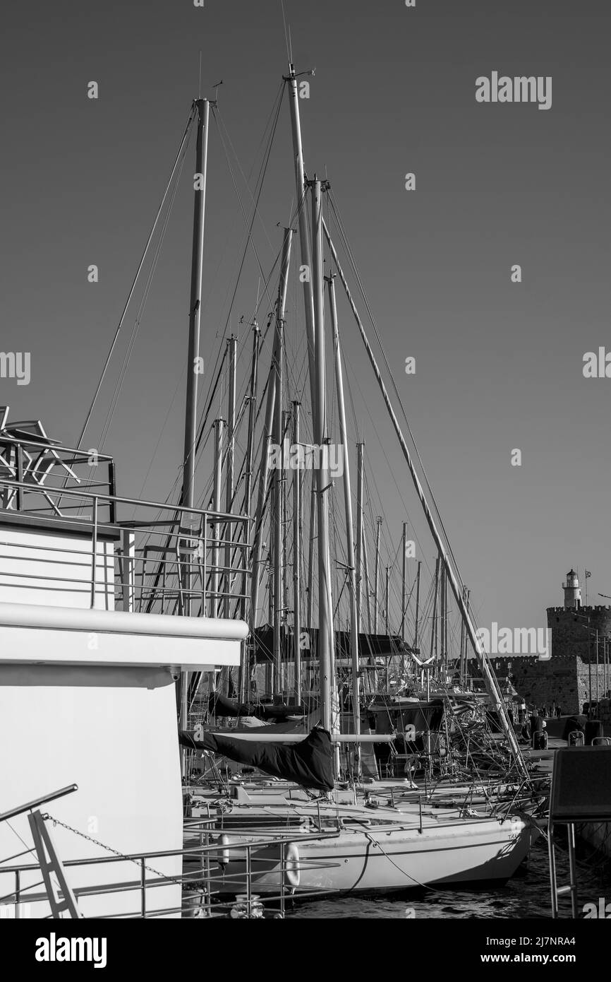 Boat masts in row in a sunny day.in Black and white Stock Photo - Alamy