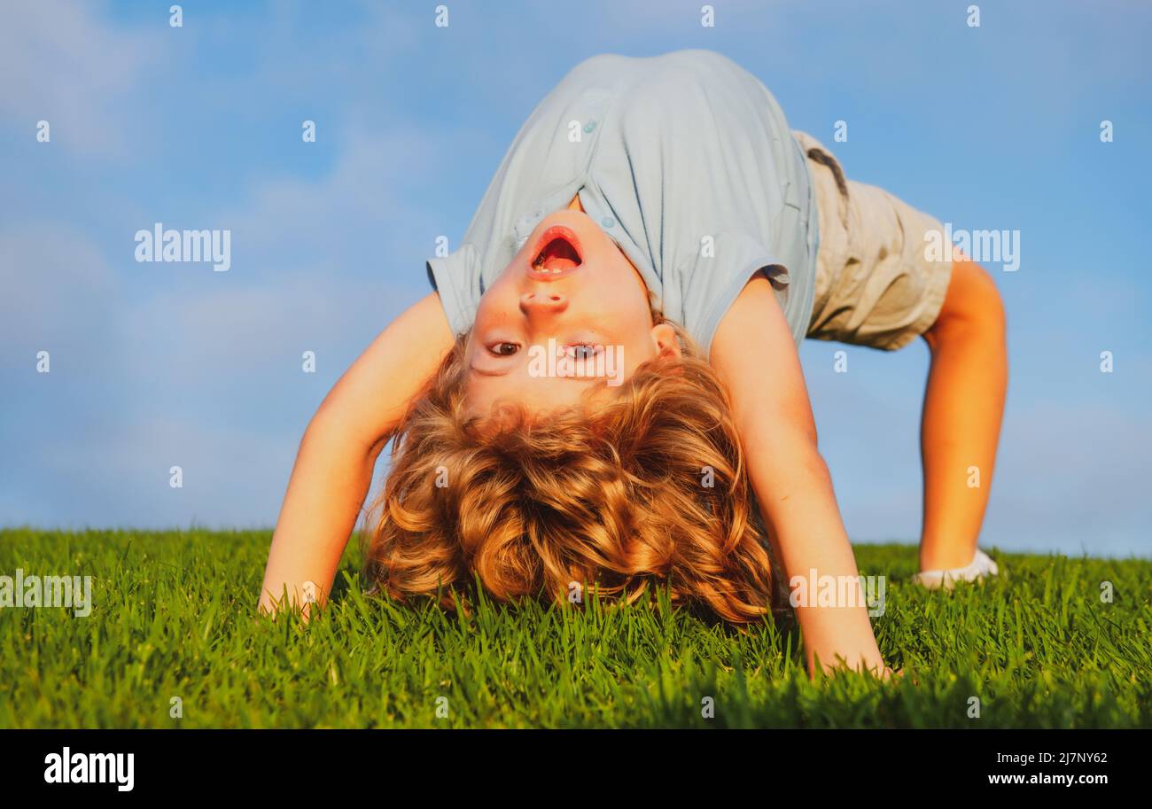 Headstand kid hi-res stock photography and images - Alamy