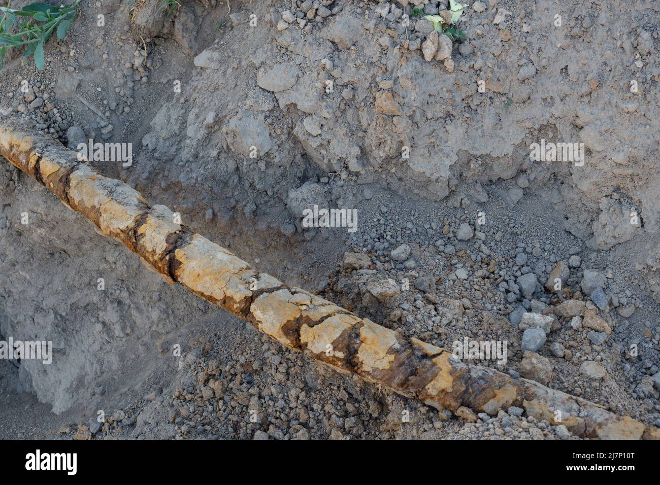 Very old earth cable, dug out of the ground. Corrosion marks on old ...