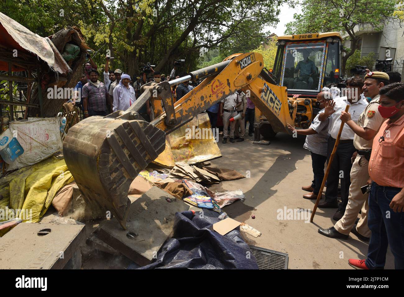 NEW DELHI, INDIA - MAY 10: MCD officials remove the encroached ...