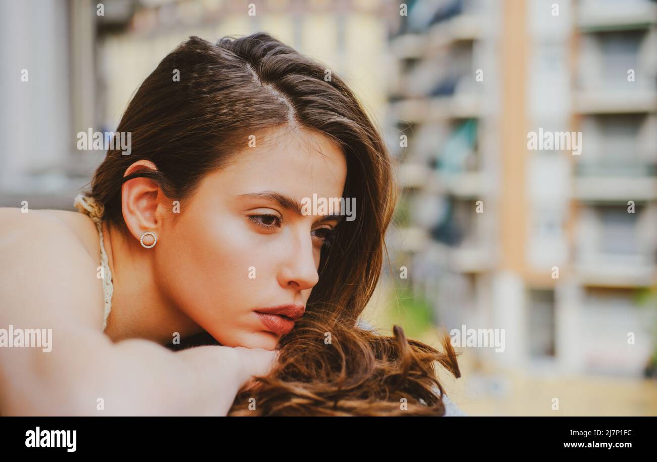 Sad woman outdoor. Luxury portrait. City girl. Fashion and beauty ...