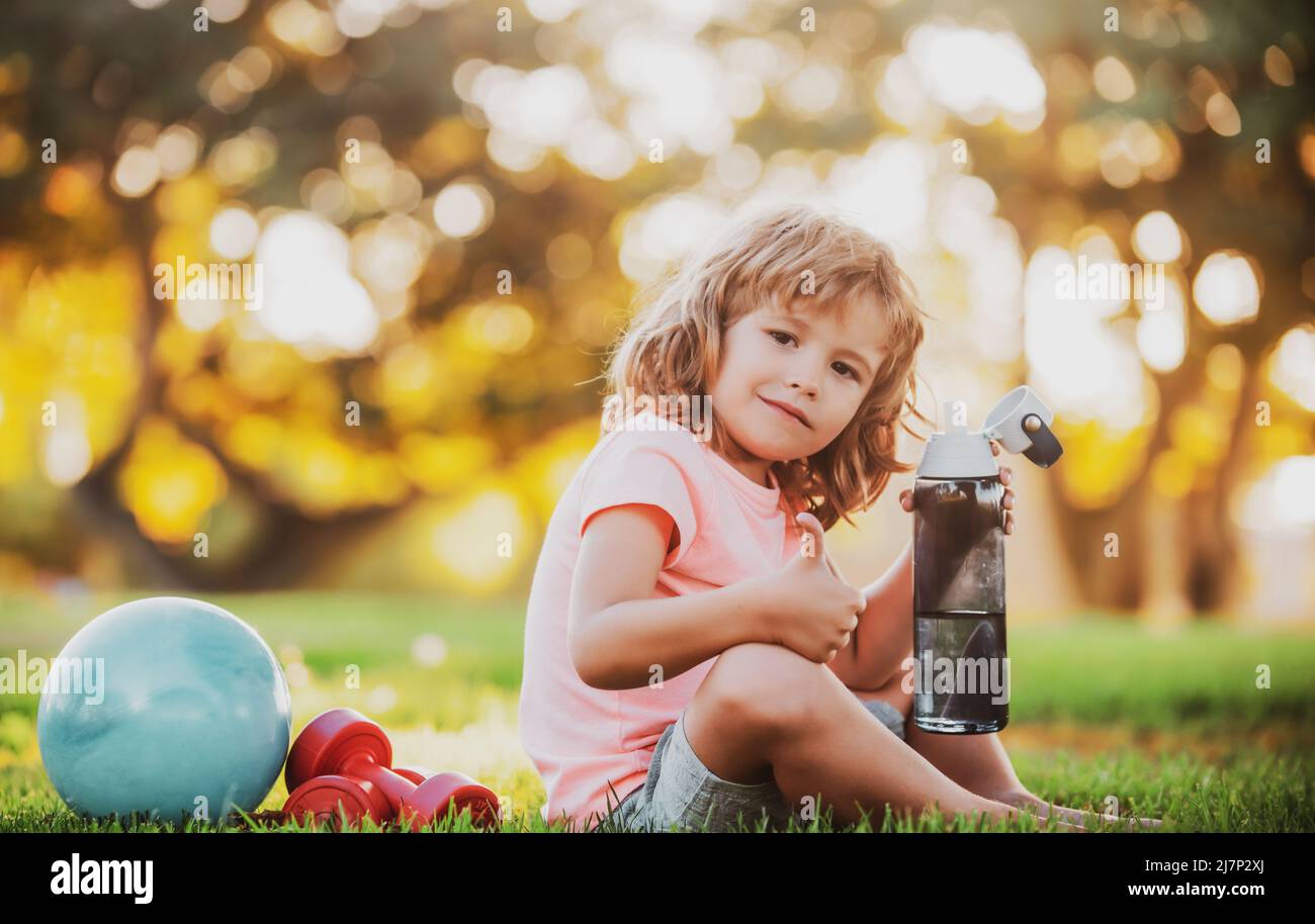 Child sport. Boy drinking water outdoor. Sport Child Fitness, health ...