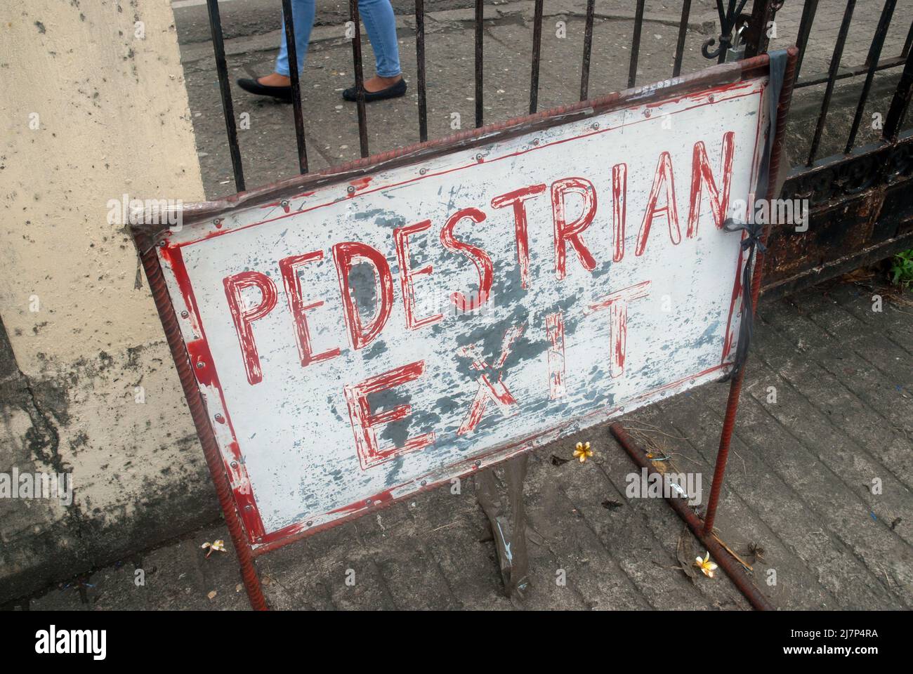 Pedestrian exit sign outside Jaro Metropolitan Cathedral, Iloilo City ...