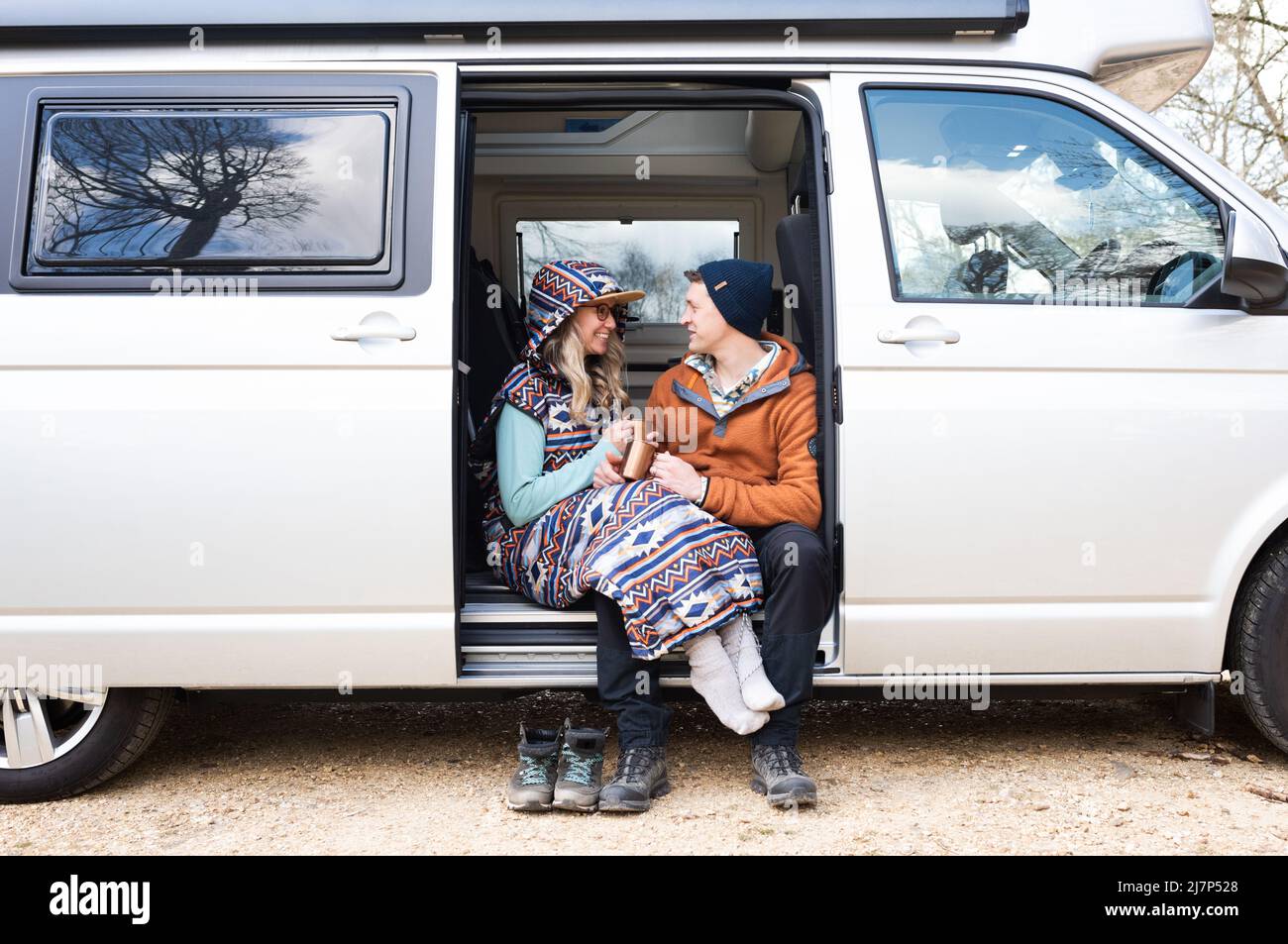 Couple and campervan hi-res stock photography and images - Alamy