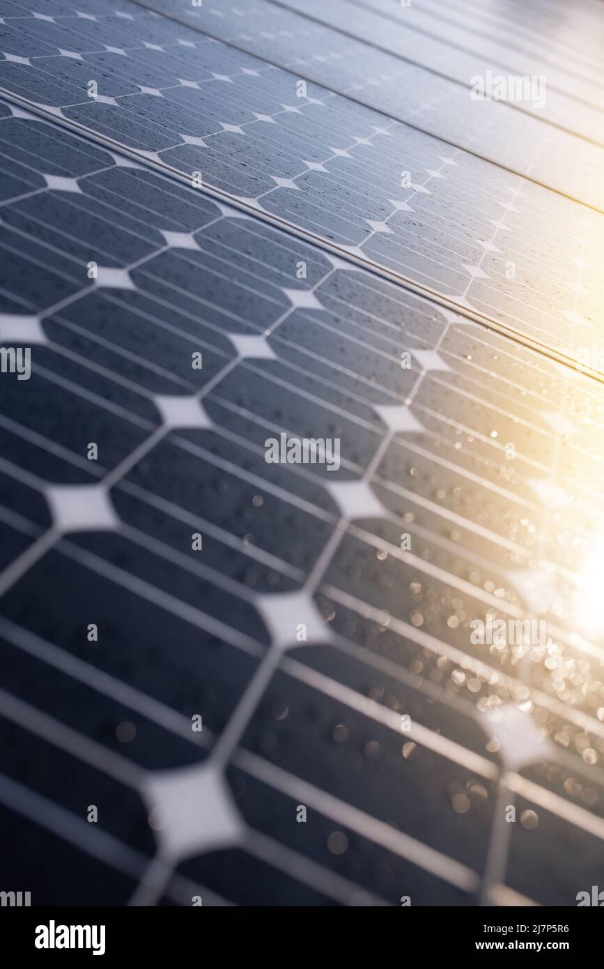 Photovoltaic modules solar power plant in the sunset Stock Photo - Alamy
