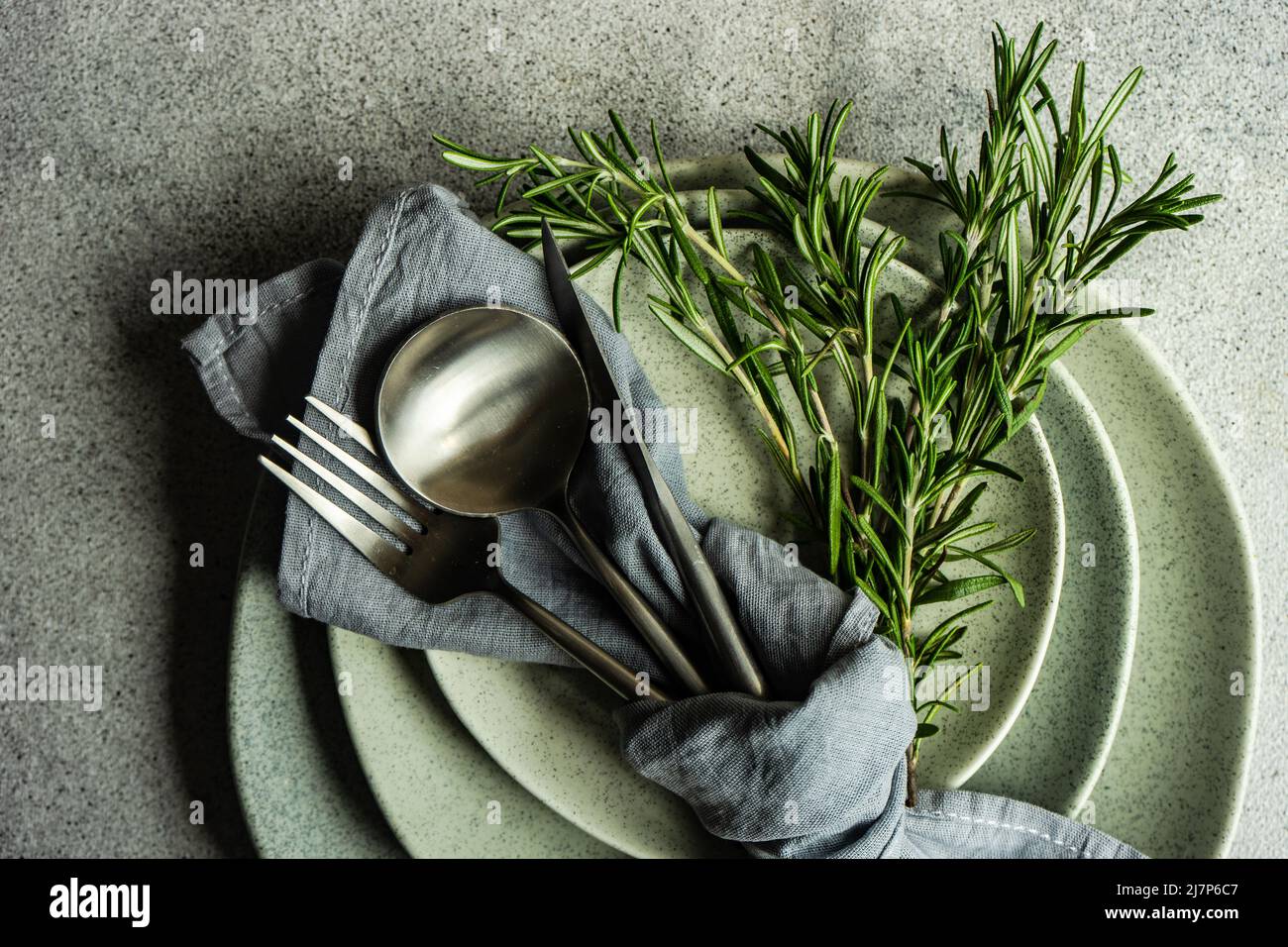 Minimalistic table setting with rustic towel Stock Photo - Alamy