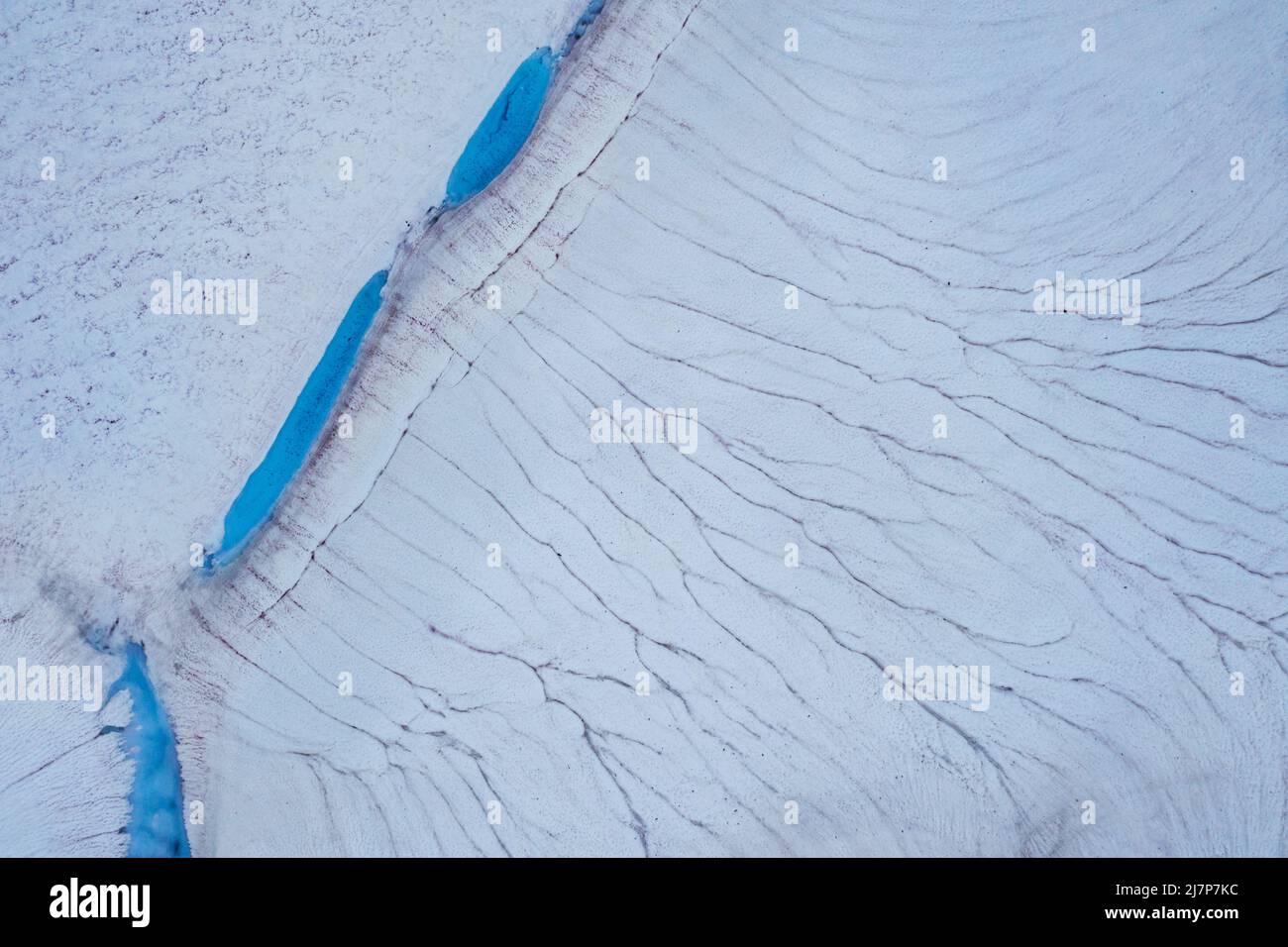 Patterns in the melting snow on Twin Lakes, high in the Washingt Stock ...