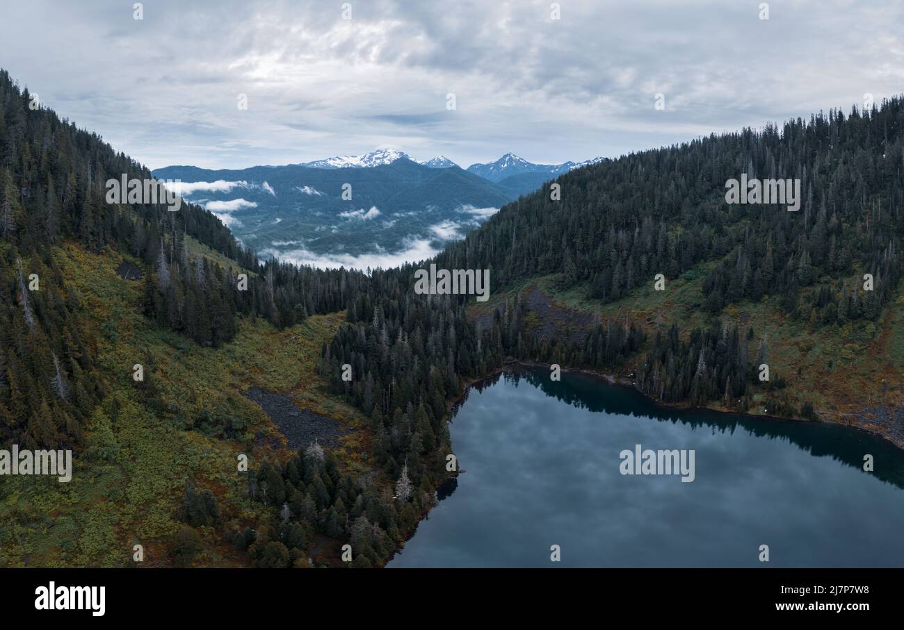 The Cascade Range stretches out, seen here above Lake 22 Stock Photo ...