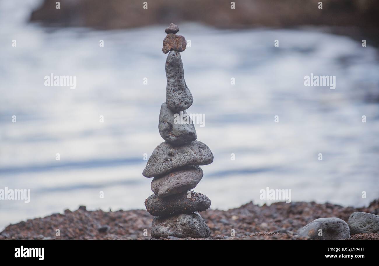 Pyramid of sea pebbles on beach. Life balance and harmony concept ...