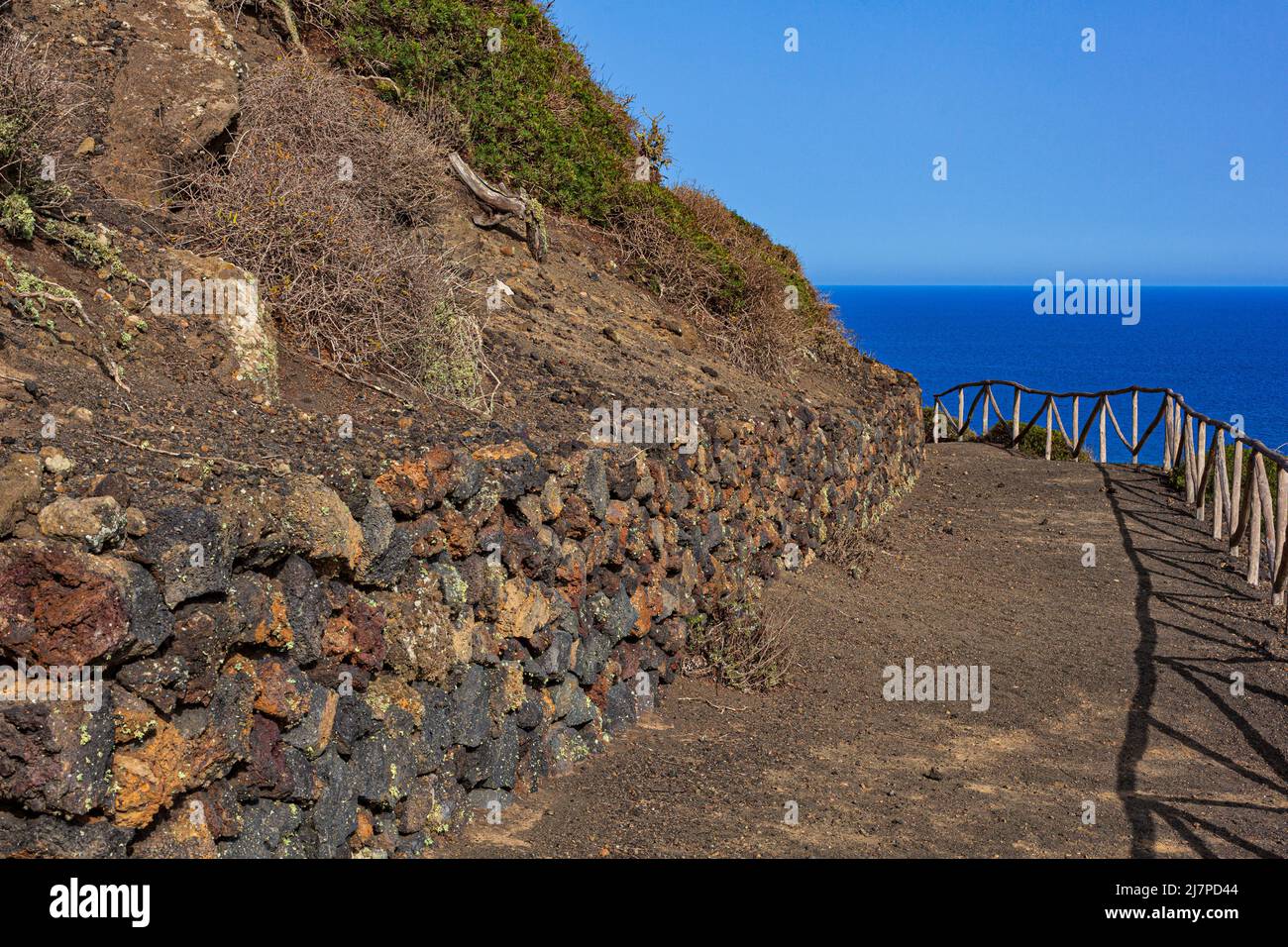 Path to the Volcano Monte Nero of Linosa. Characteristic country road ...