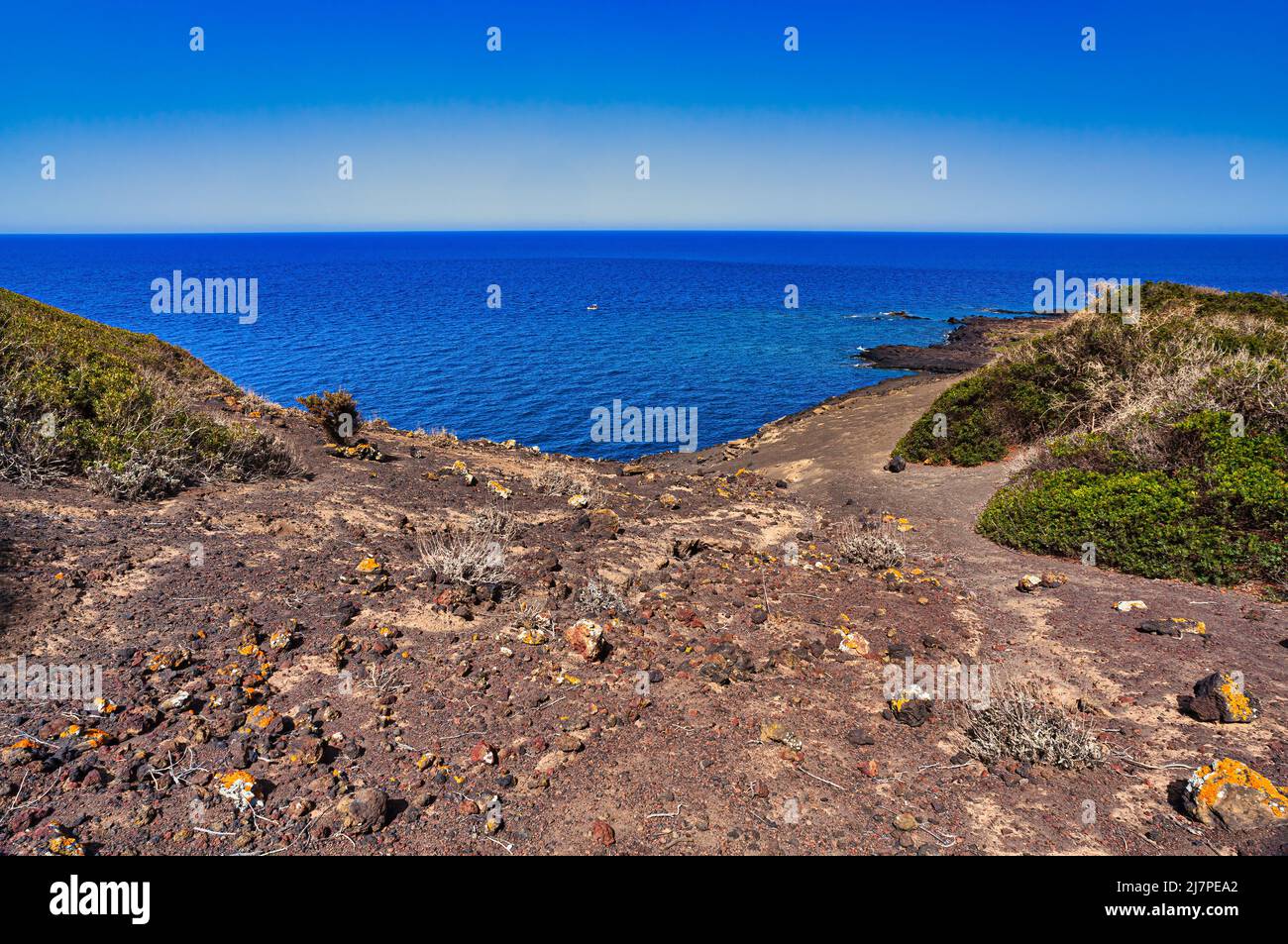 View of the scenic lava rock cliff in the Linosa island. Sicily Stock ...