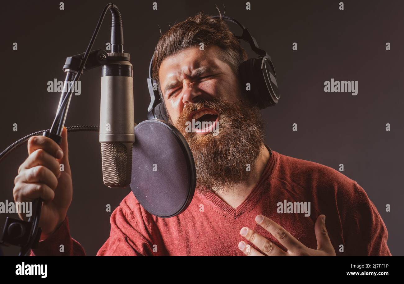 Portrait of man in recording studio. Expression face close up. Music ...