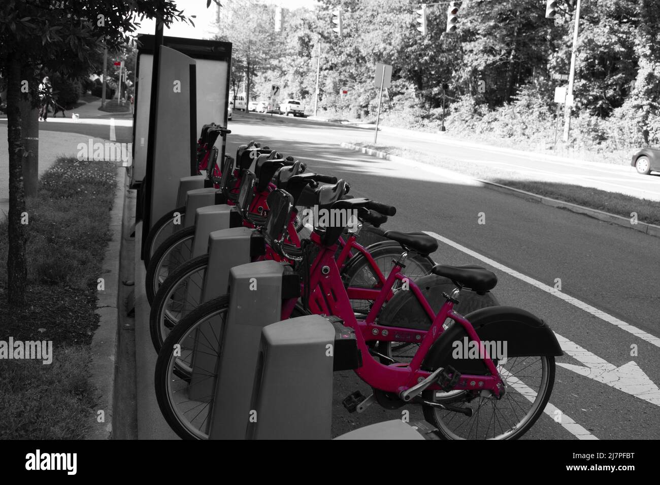 Bike Share station built next to a road in city area Stock Photo - Alamy