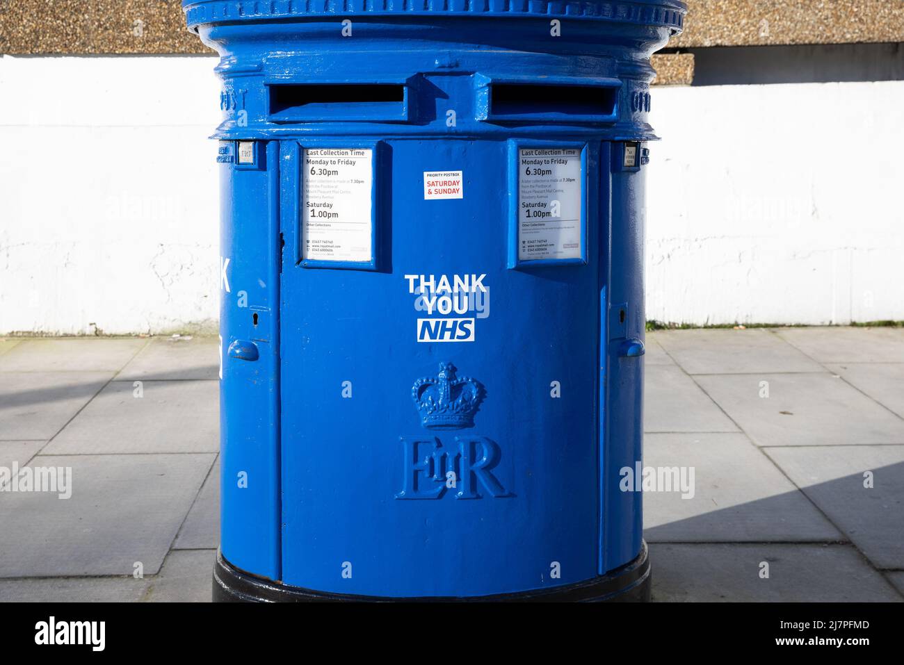 A blue postbox in support of the NHS outside St Thomas's Hospital in ...