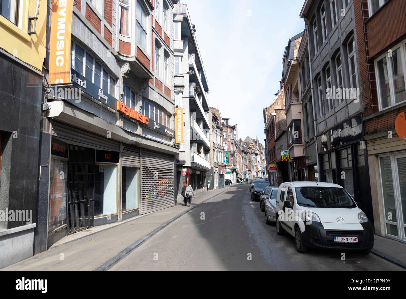 Liège, Belgium - April 20, 2022: Storefronts on a quiet downtown street ...