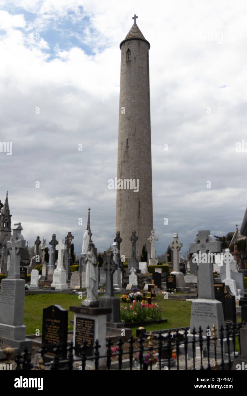 Tower over the tomb of Daniel O'Connell stands above gravesites and ...