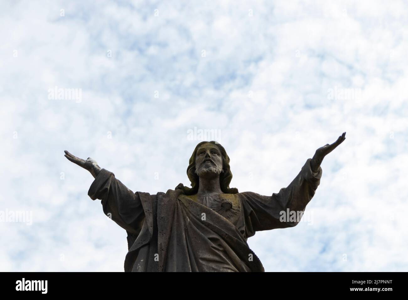 Jesus christ statue in cemetery hi-res stock photography and images - Alamy