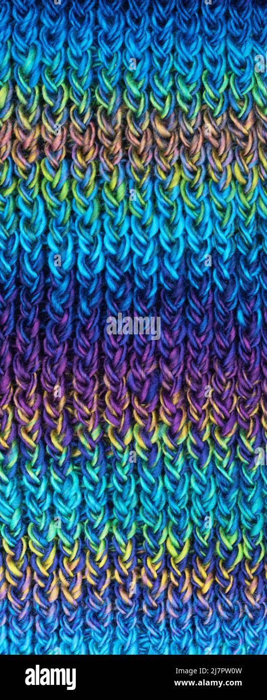 Close up on multi colors yarn, knitted pattern of purl and knit Stock ...