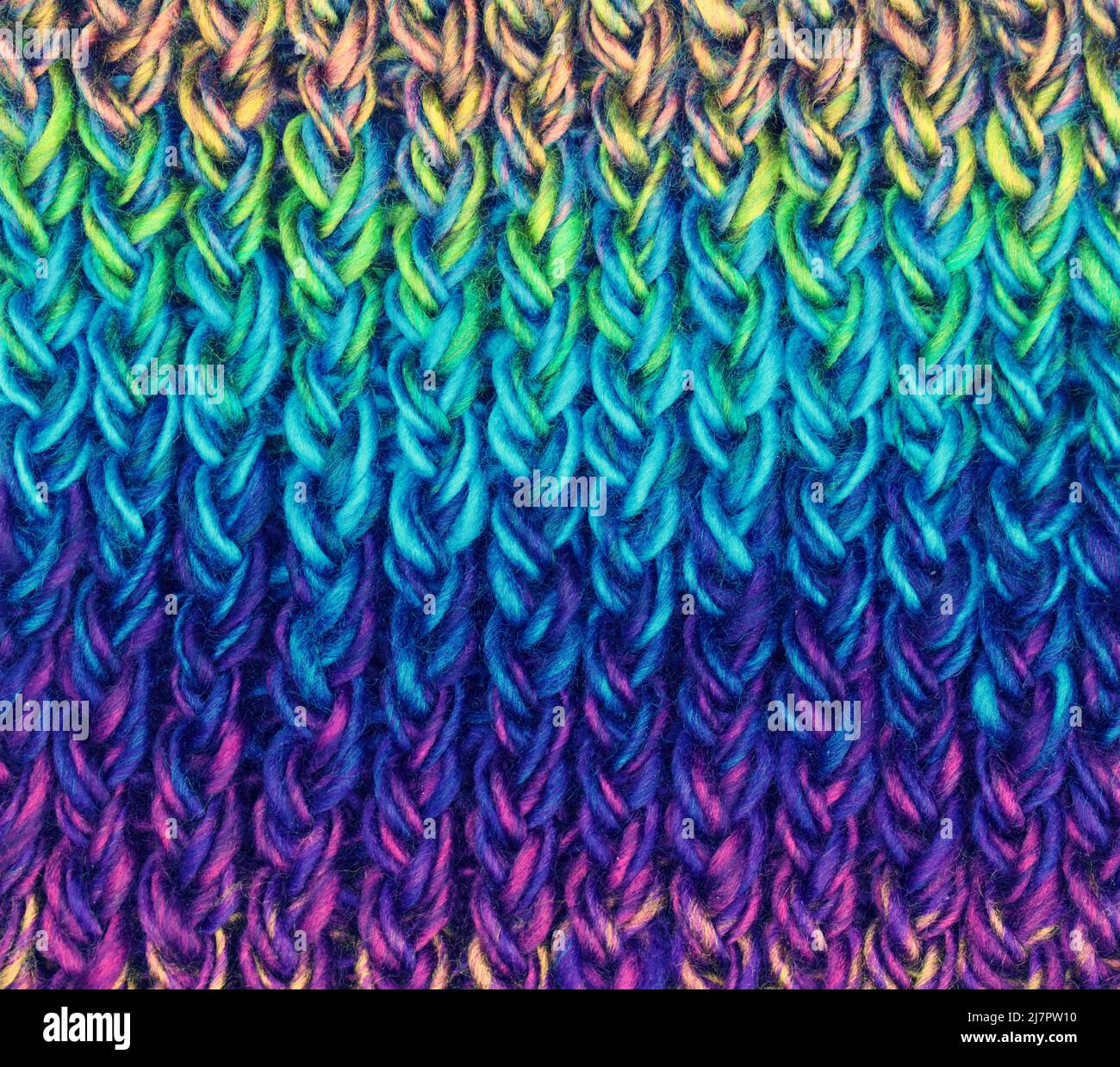Close up on multi colors yarn, knitted pattern of purl and knit Stock ...