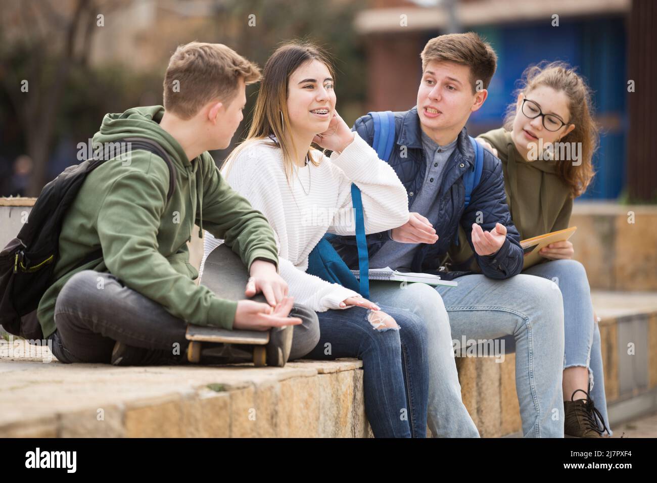 Group of positive teenagers having fun together Stock Photo - Alamy