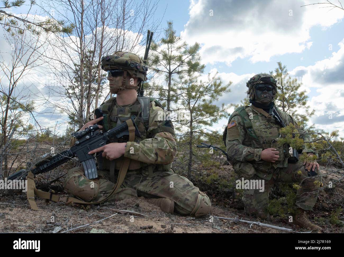 U.S. Army Sgt. Charles Ivey, left, and 1st Lt. Aidan Baxter, right ...