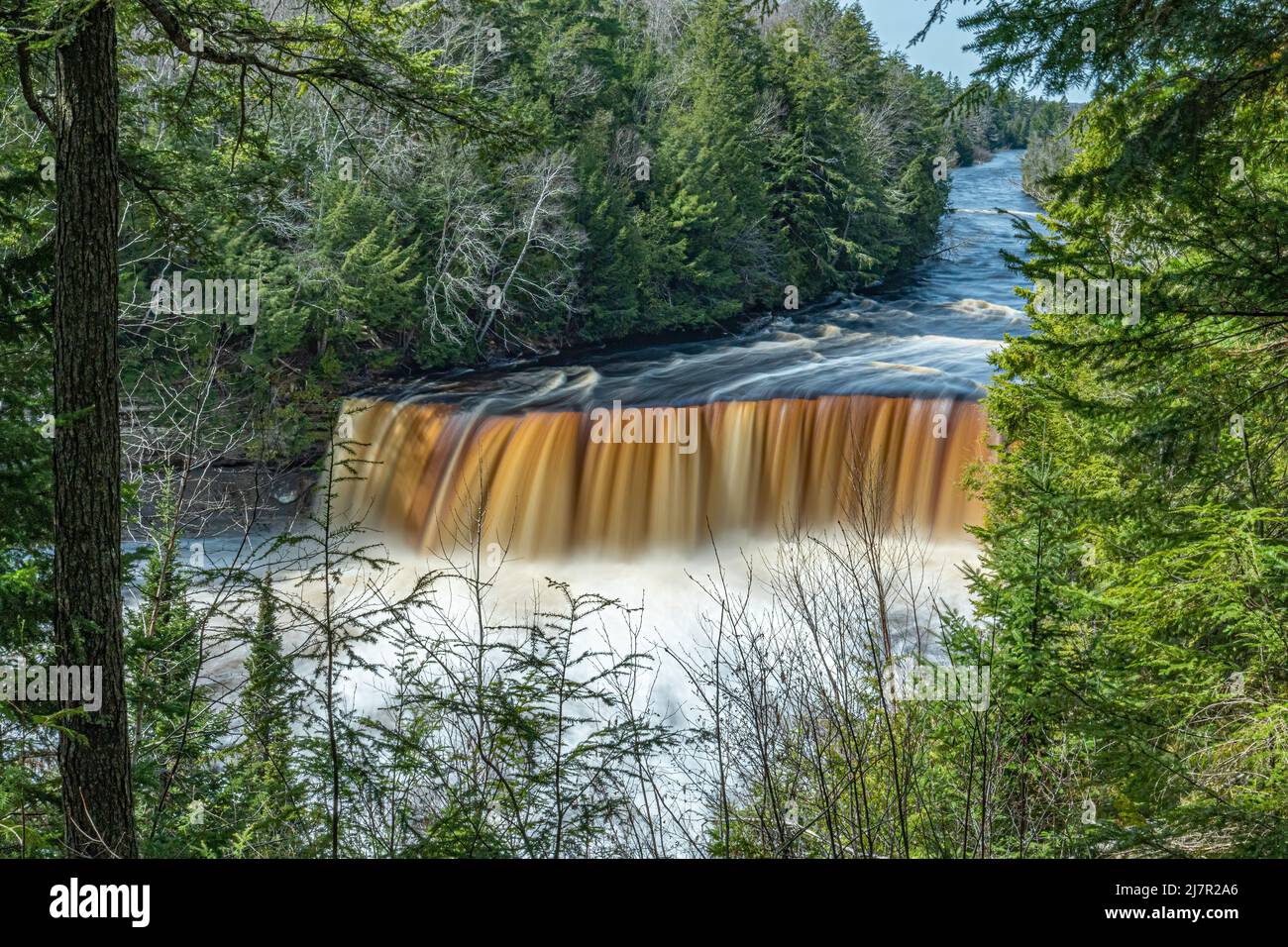An early spring view of upper Tahquamenon Falls in the Upper Peninsula ...