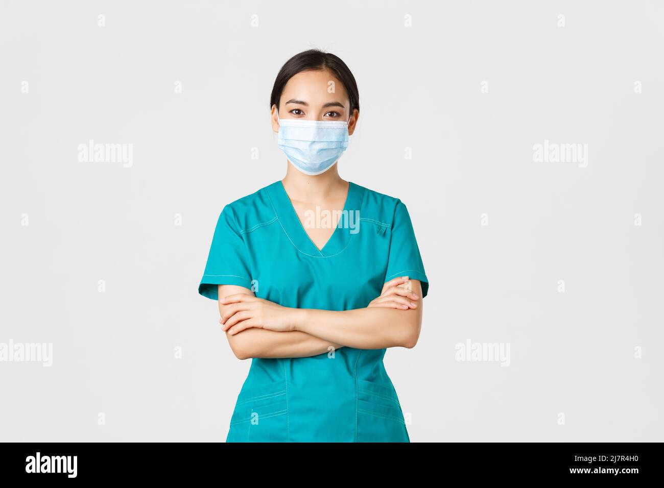 Covid-19, coronavirus disease, healthcare workers concept. Smiling ...