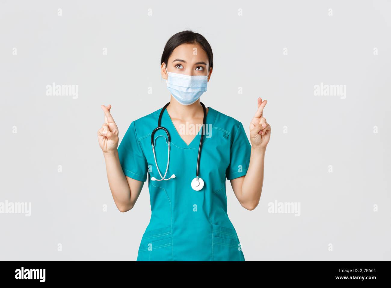 Covid-19, coronavirus disease, healthcare workers concept. Hopeful ...