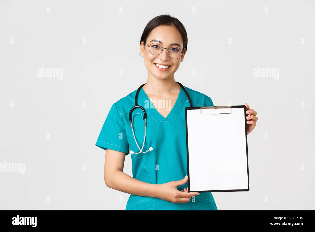 Covid-19, coronavirus disease, healthcare workers concept. Smiling ...