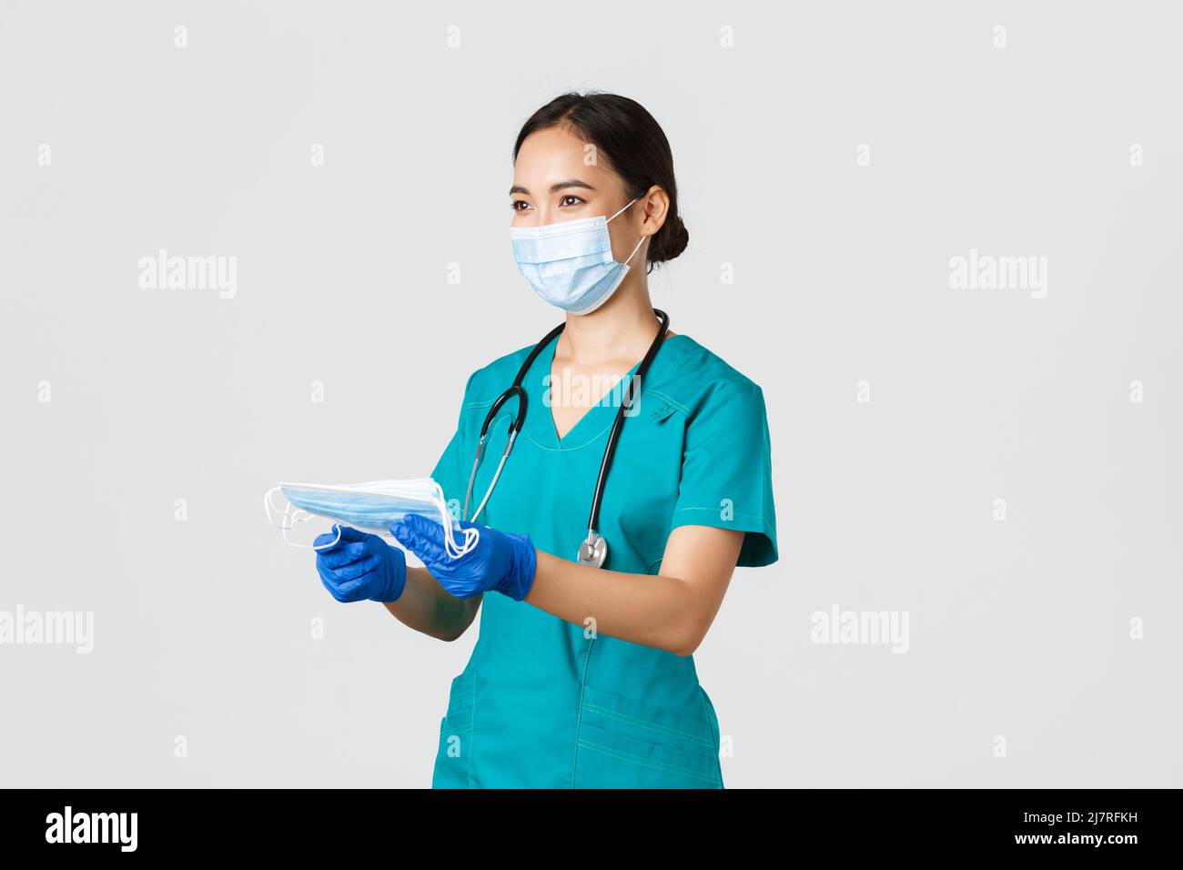 Covid-19, coronavirus disease, healthcare workers concept. Smiling ...