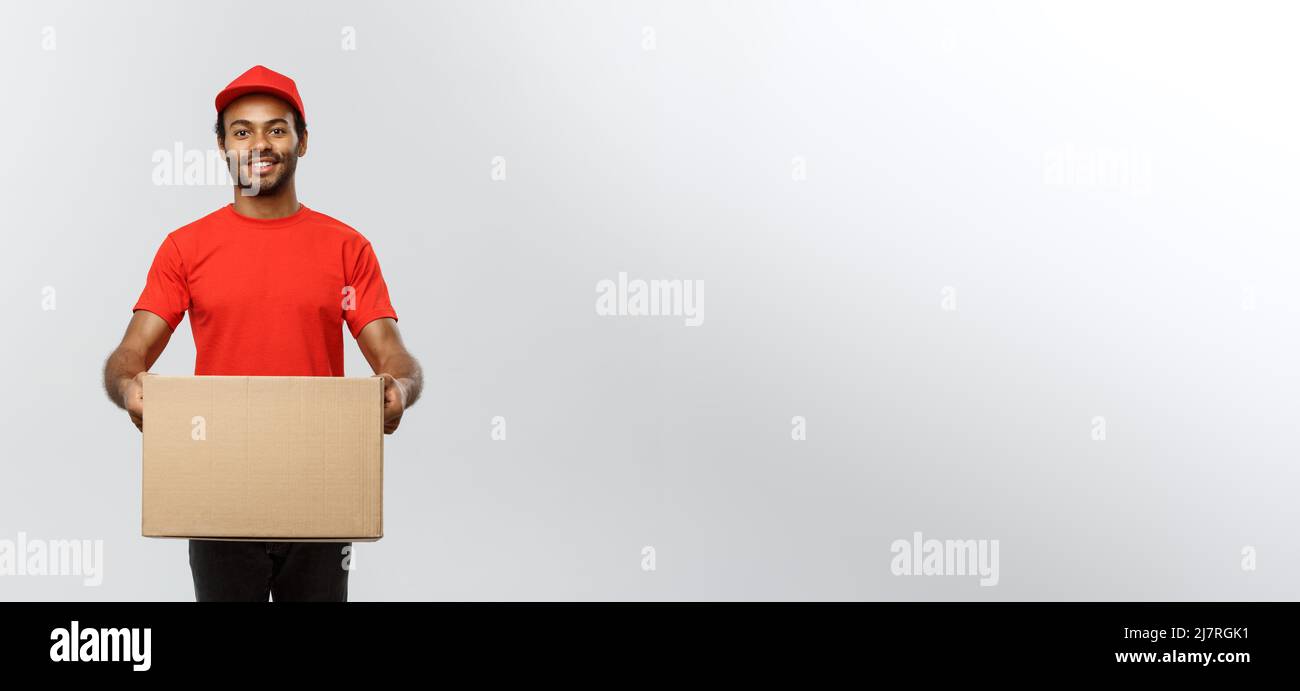 Delivery Concept - Portrait of Happy African American delivery man in ...