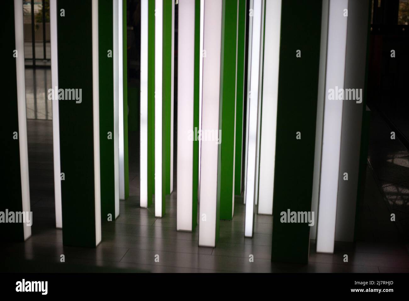 Vertical lamps. Lamp light from rack. Details of design of lighting ...