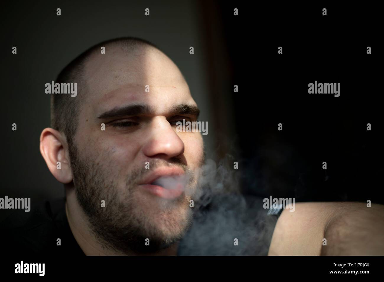 Man cigarette in mouth young hi-res stock photography and images - Alamy