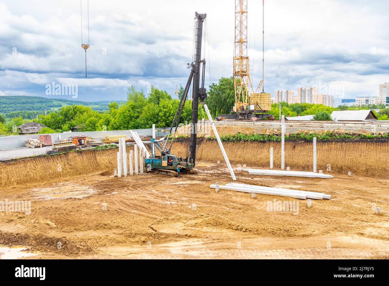 construction work in a pit - a pile foundation for a heavy structure ...