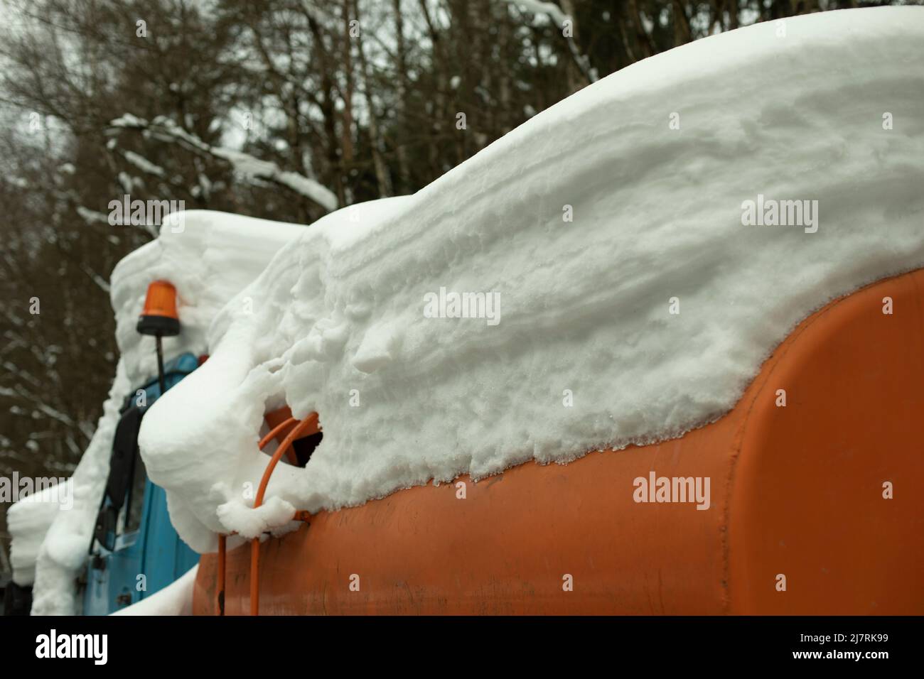 Hill of snow on car. Transport in winter. Truck in snowstorm. Car in ...