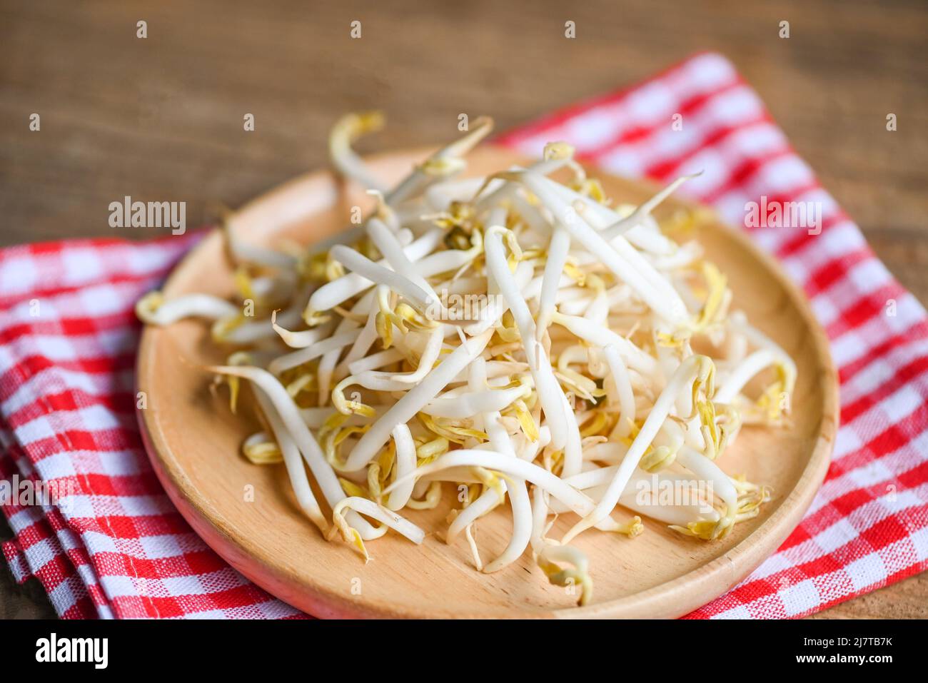 Bean sprouts on wooden plate table background in the kitchen, Raw white ...